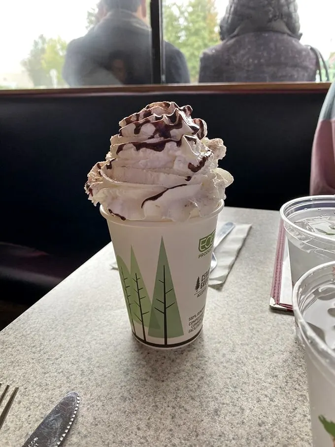 This hot chocolate isn't a drink, it's a cloud-topped mountain of cocoa bliss. Marshmallow dreams, anyone?