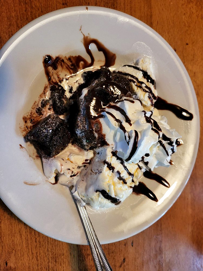 Chocolate lava cake that erupts with warm fudgy goodness—the kind of dessert that silences conversation and demands full attention.