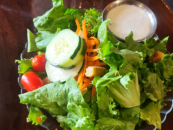A salad that doesn't feel like punishment. This vibrant bowl of greens is proof that eating healthy can be downright delicious – and surprisingly filling!