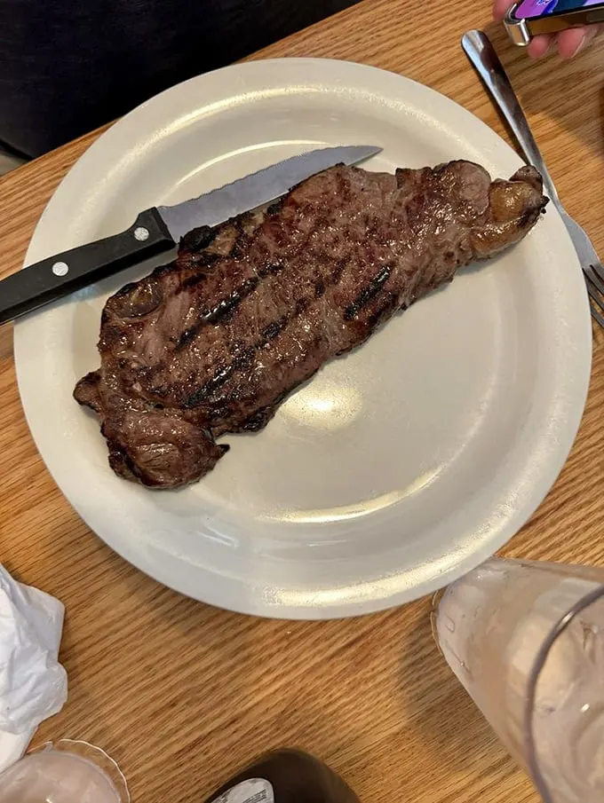 Holy cow! This steak is so perfectly grilled, it could make a vegetarian reconsider their life choices. It's not just a meal, it's a carnivore's dream come true.
