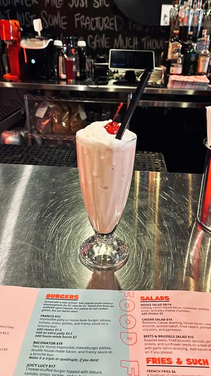 Shake it up, baby! This strawberry milkshake is so thick and creamy, you might need to train for marathon sipping sessions.