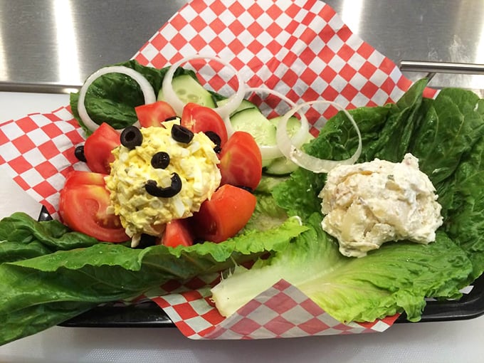 Even the salads get special treatment—a stuffed tomato creation that makes eating vegetables feel like breaking the rules.