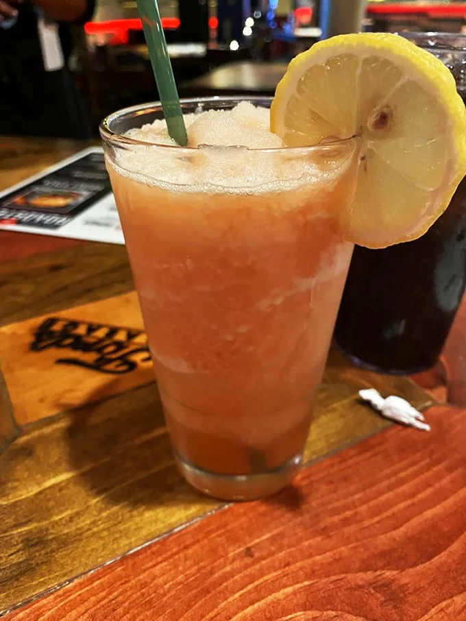 That's not just lemonade—it's summer in a glass, the perfect counterbalance to a meal that might require loosening your belt afterward.