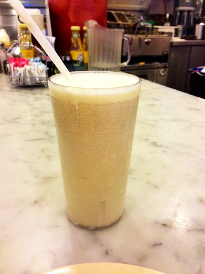 Freeze frame! This creamy orange concoction is like a hug for your taste buds – cool, refreshing, and oh-so-comforting.