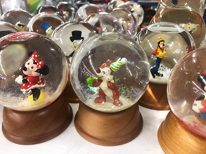 Tiny worlds captured in glass—where Disney characters frolic in perpetual winter. Childhood nostalgia without the Disney World price tag.
