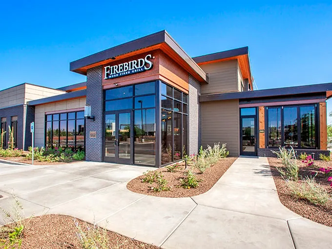 Firebirds: Where modern meets mouthwatering. It's like the cool kid of steakhouses – everyone wants to hang out here!