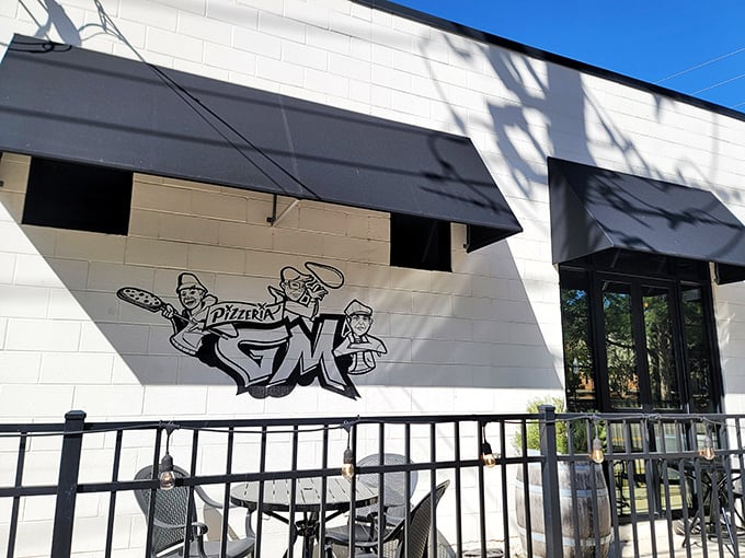 Pizza with personality! G.M.'s funky facade hints at the creative pies waiting inside.