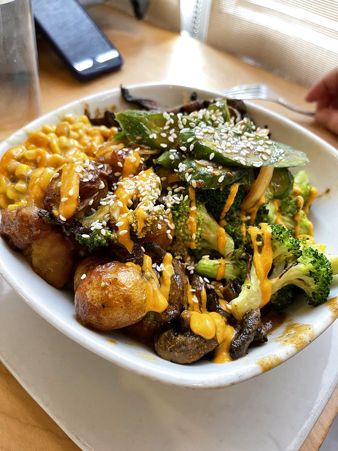 This Buddha bowl doesn't just feed your body—it feeds your Instagram. The sauce alone deserves its own TED Talk.