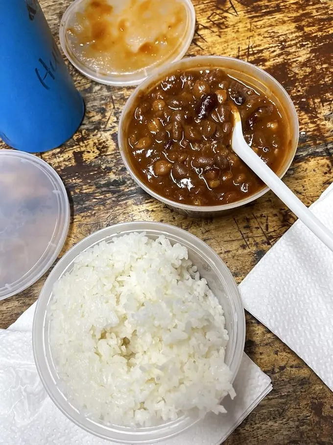 Baked beans: The unsung hero of barbecue. These little legumes are swimming in a sauce so good, you'll want to bottle it.