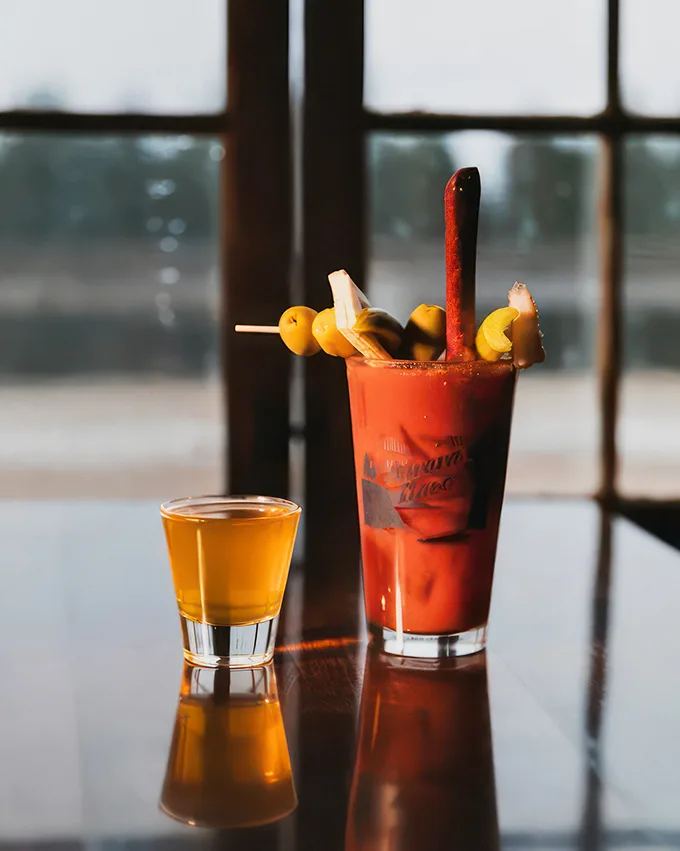 This Bloody Mary isn't just a drink, it's a meal in a glass! Garnished to perfection, it's breakfast, lunch, and happy hour all in one.