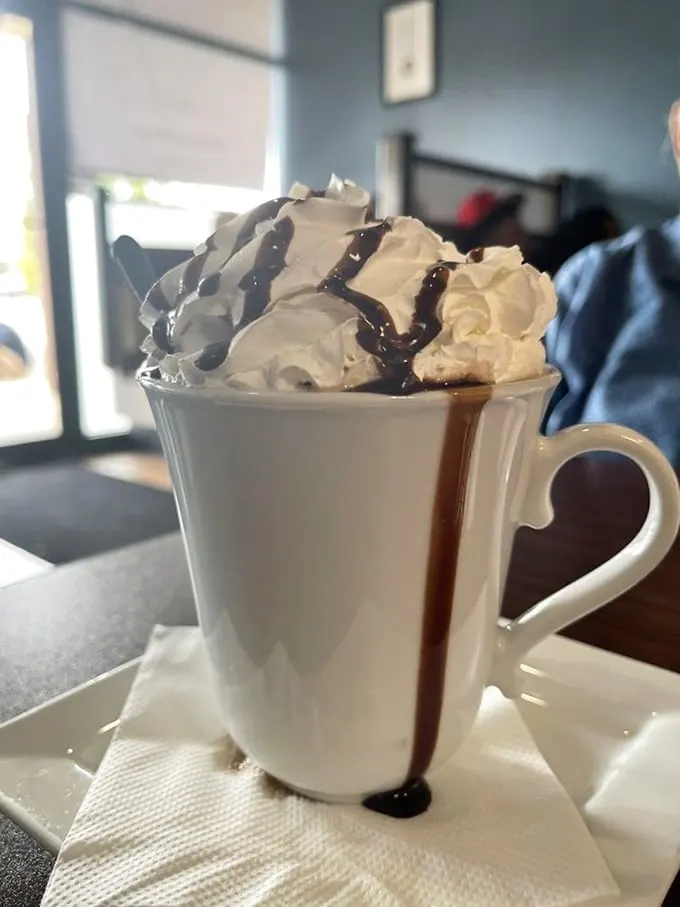 Chocolate milk for grown-ups! This decadent drink is like a hug for your inner child, complete with a whipped cream toupee.