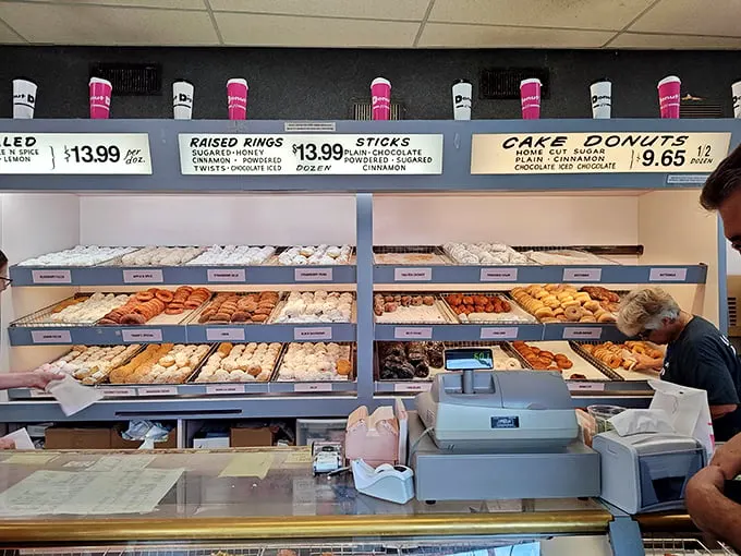 Where the magic happens! The counter at Donut Dip is like a backstage pass to donut nirvana – watch the pros work their sweet, sweet magic.