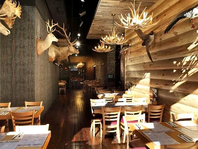 The dining area is like a cozy lodge where Paul Bunyan might grab a bite. It's the perfect blend of rustic charm and modern comfort.