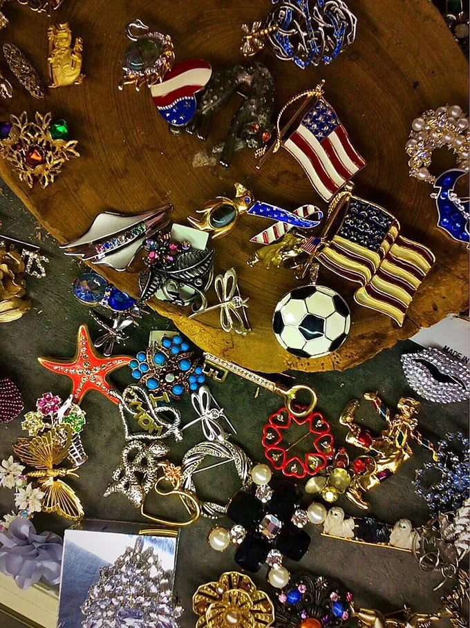 Pin-tastic finds! From Old Glory to soccer balls, these enamel pins are tiny treasures waiting to adorn your jacket.