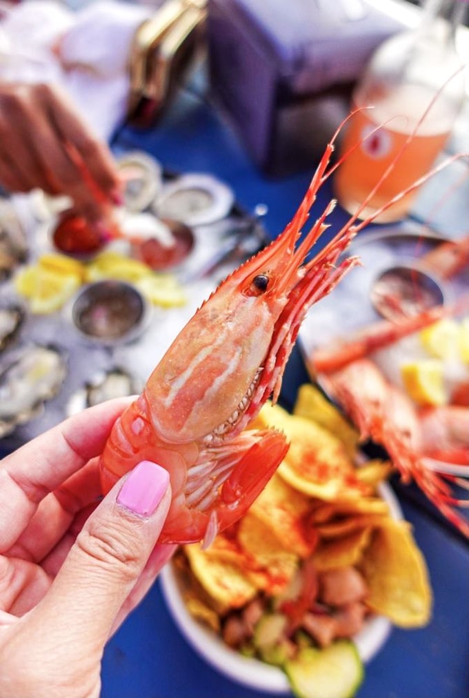 Hold on to your taste buds! These prawns are so fresh, they might just swim right off your plate. A little lemon, a little cocktail sauce, seafood nirvana.