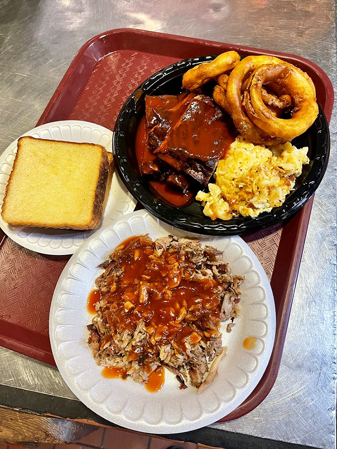 Rib nirvana achieved! This combo plate is a carnivore's dream come true – just don't plan on moving much afterward.