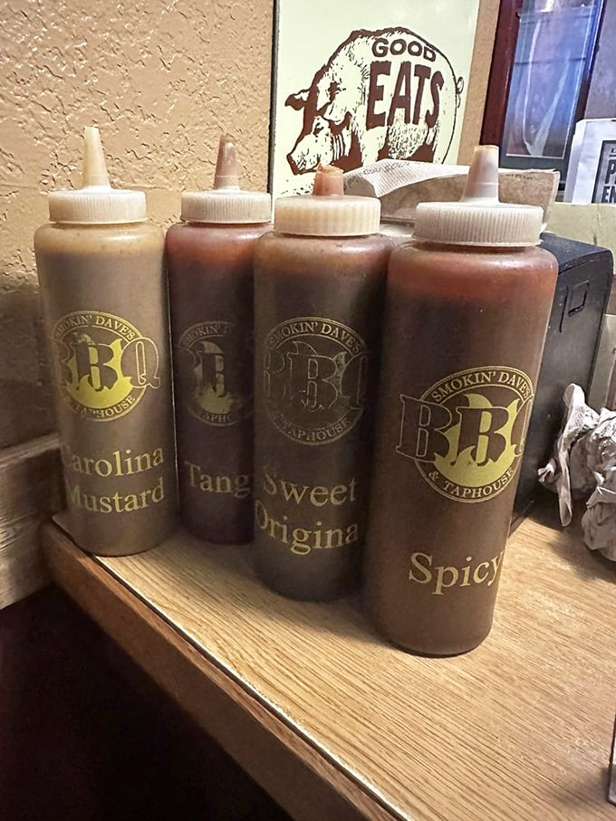 Sauce boss central! From Carolina Mustard to Spicy, these bottles hold the key to flavor town. Choose your weapon wisely, barbecue warriors!