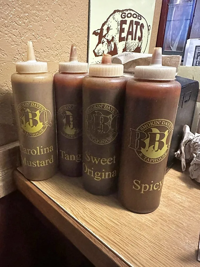 Sauce boss central! From Carolina Mustard to Spicy, these bottles hold the key to flavor town. Choose your weapon wisely, barbecue warriors!