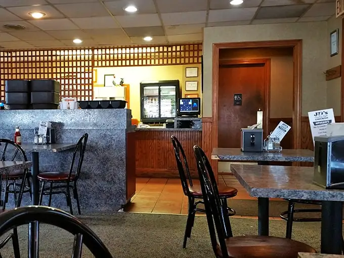 The counter where magic happens and calories don't count. Notice the wood lattice divider—architectural proof you're in a true classic.