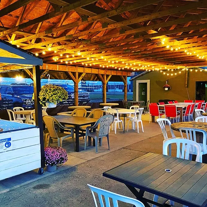 "Strings of lights and strings attached?" This outdoor seating area is perfect for those who like their meals with a side of fresh air.
