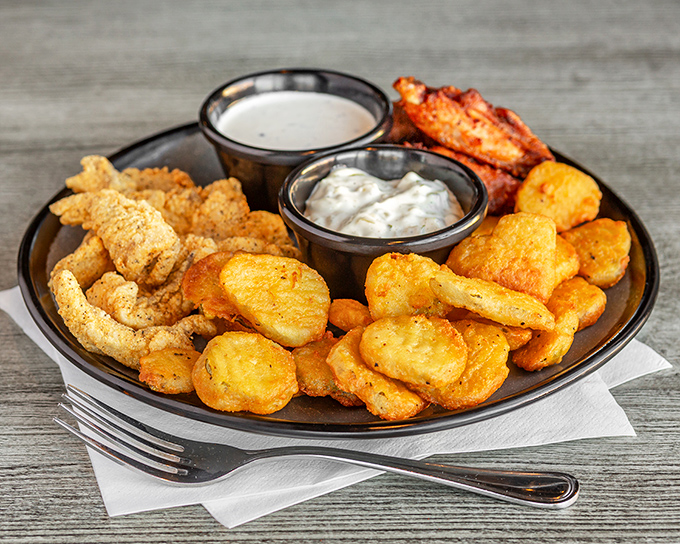 The ocean called, it wants its flavor back! This seafood platter is a crispy, golden tribute to Neptune's bounty.