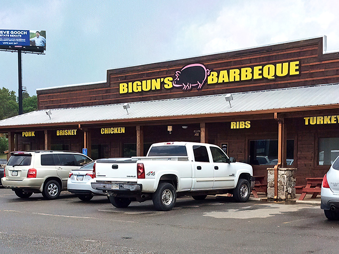 The rustic wooden exterior with bold yellow signage announces its purpose without pretense – this is barbecue country, and Bigun's means business.
