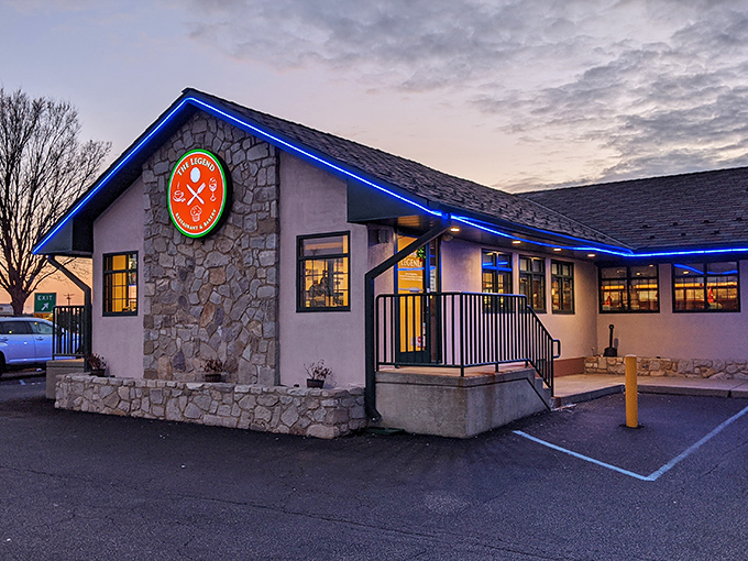 The stone facade and distinctive red clock announce your arrival at breakfast paradise—no passport required, just an appetite and the willingness to loosen a belt notch.