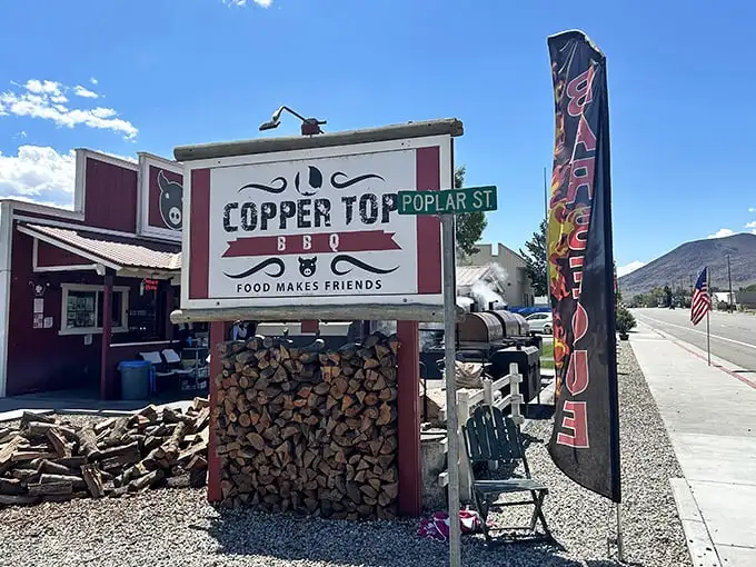 Those gleaming copper smokers aren't just for show – they're the beating heart of this roadside BBQ sanctuary in the Eastern Sierra.