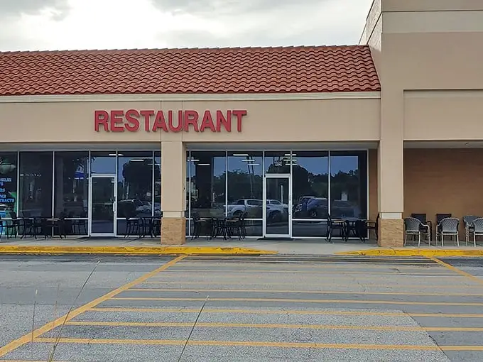 The unassuming exterior of Ram's Family Restaurant proves once again that Florida's best breakfast spots don't need fancy facades—just follow the packed parking lot.