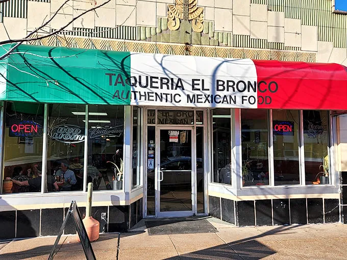 The tri-colored awning proudly declares "AUTHENTIC MEXICAN FOOD" – a modest promise this Cherokee Street gem delivers on with surprising gusto.