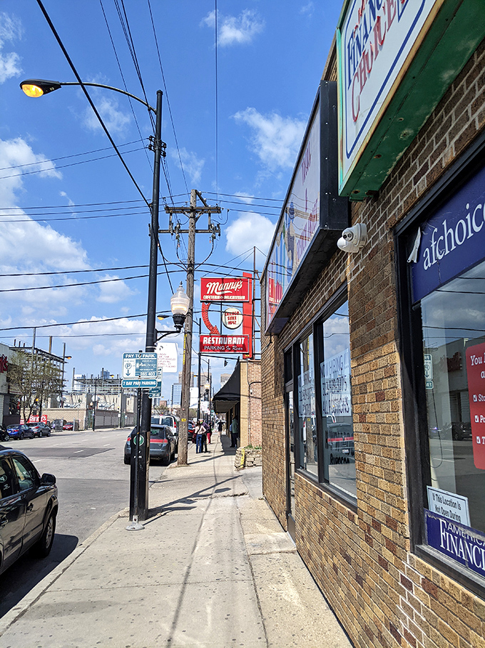 Chicago's skyline plays second fiddle to the real star—that iconic red Manny's sign promising delicatessen delights since 1942.