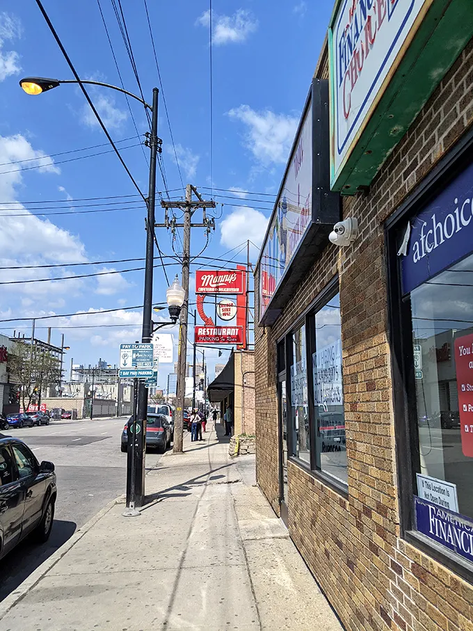 Chicago's skyline plays second fiddle to the real star—that iconic red Manny's sign promising delicatessen delights since 1942.