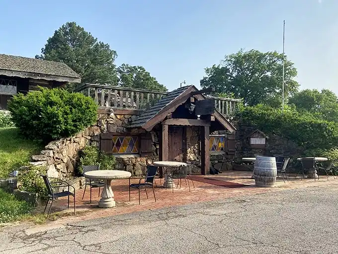 The Swiss chalet of your dreams isn't in the Alps—it's hiding in Arkansas! This stone-and-timber entrance promises Old World magic behind that wooden door.