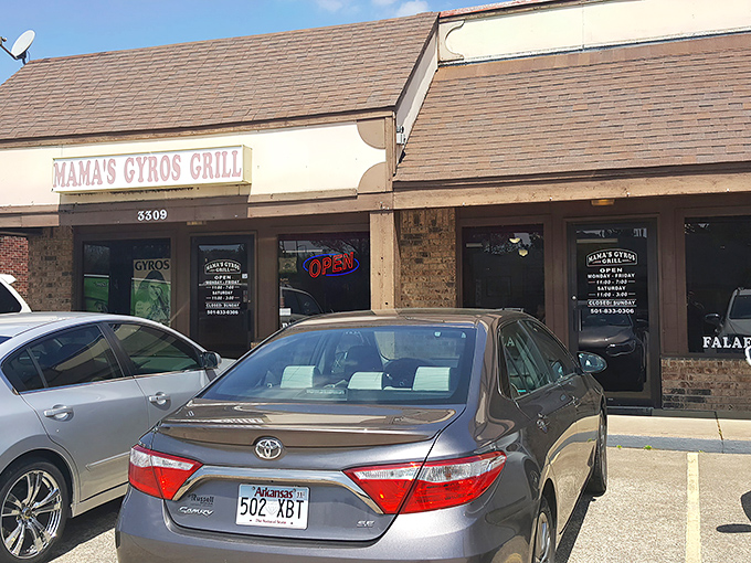 The unassuming storefront promises nothing but delivers everything—culinary magic hiding in plain sight on a Sherwood strip mall.