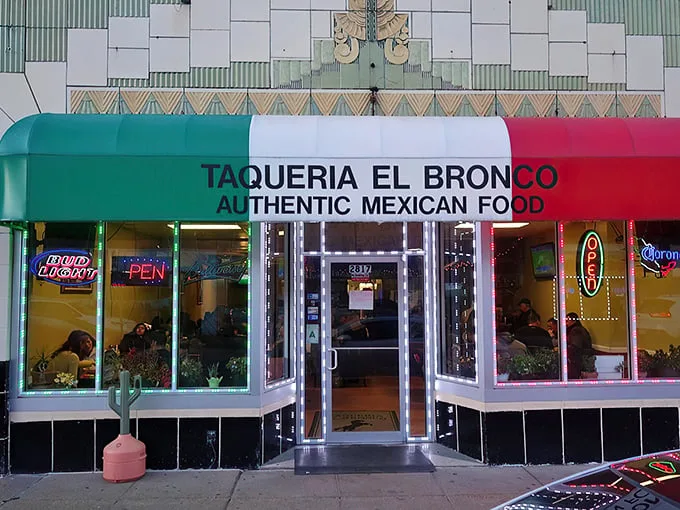 The tri-colored awning proudly declares "AUTHENTIC MEXICAN FOOD" – a modest promise this Cherokee Street gem delivers on with surprising gusto.