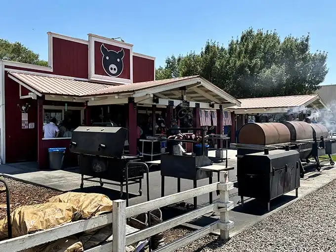 Those gleaming copper smokers aren't just for show – they're the beating heart of this roadside BBQ sanctuary in the Eastern Sierra.