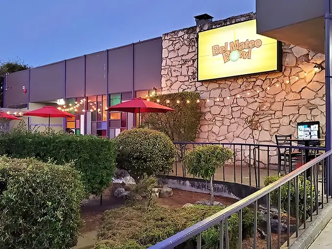 The iconic stone facade and glowing sign of Bel Mateo Bowl welcomes night owls and early birds alike to this San Mateo institution.