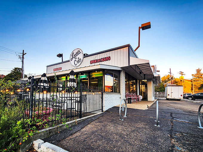 Louie's circular sign has beckoned hungry Baton Rouge residents since 1941—a beacon of breakfast hope against the Louisiana sky.