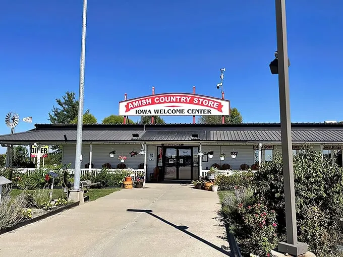 The iconic red sign beckons like a lighthouse for hungry travelers – proof that the best discoveries often happen when you actually exit the interstate.