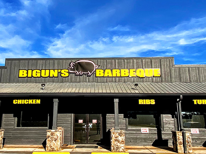 The rustic wooden exterior with bold yellow signage announces its purpose without pretense – this is barbecue country, and Bigun's means business.