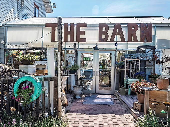 That iconic rusty sign isn't just weathered—it's a beacon calling to treasure hunters everywhere. The Barn's exterior promises adventures within.