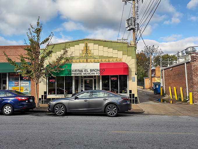 The tri-colored awning proudly declares "AUTHENTIC MEXICAN FOOD" – a modest promise this Cherokee Street gem delivers on with surprising gusto.