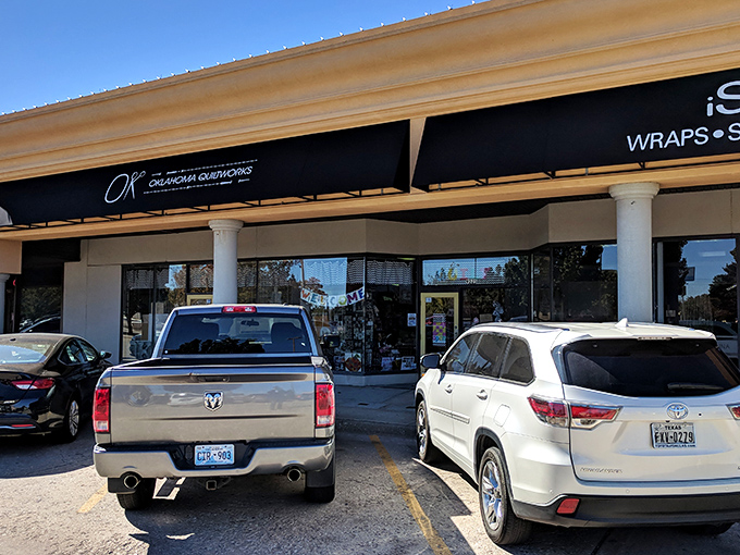 The sunny yellow door of Oklahoma Quiltworks beckons fabric enthusiasts like a textile Bat-Signal. Creative adventures await inside this unassuming storefront.