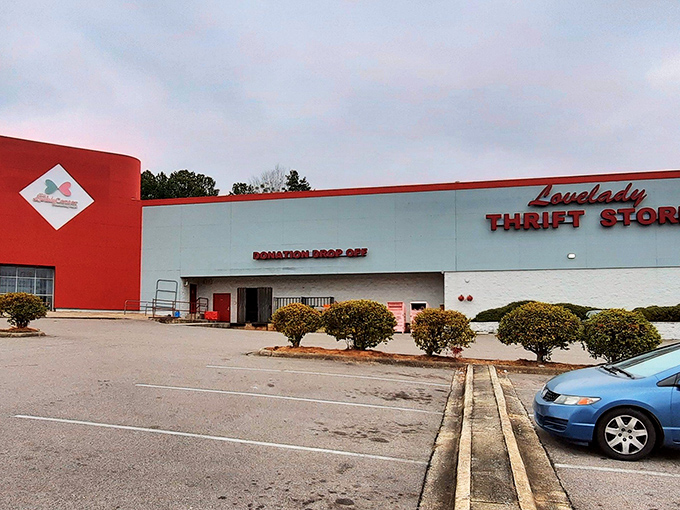 The iconic red and white exterior of Lovelady Thrift Store stands out against Alabama's blue sky like a beacon for bargain hunters everywhere.