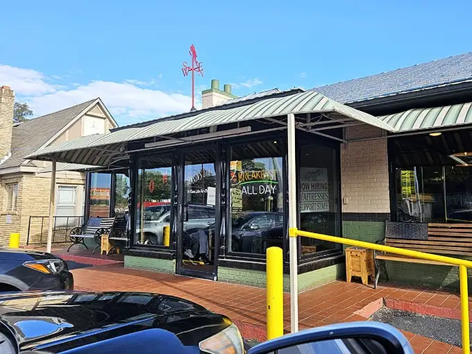 The parking sign says it all – this isn't just a meal, it's a destination worth navigating to. Benson's Grill beckons hungry travelers under clear Arkansas skies.