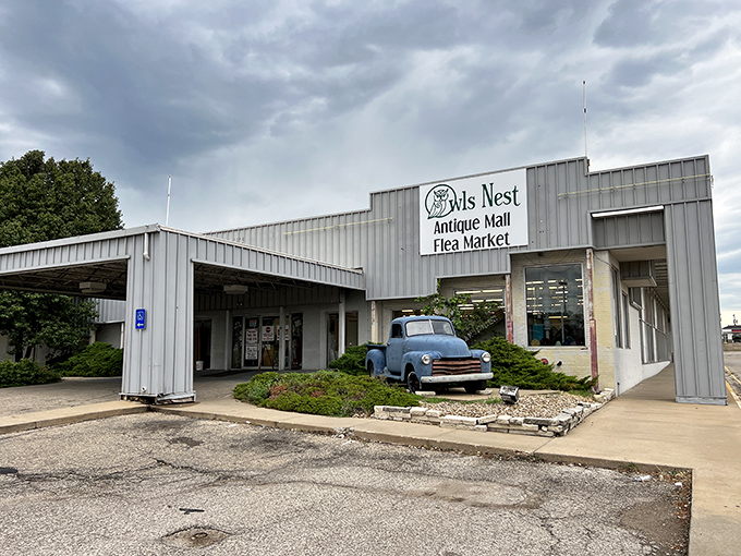 The unassuming exterior of Owls Nest hides a universe of treasures within, like finding a portal to the past behind that classic blue pickup truck.