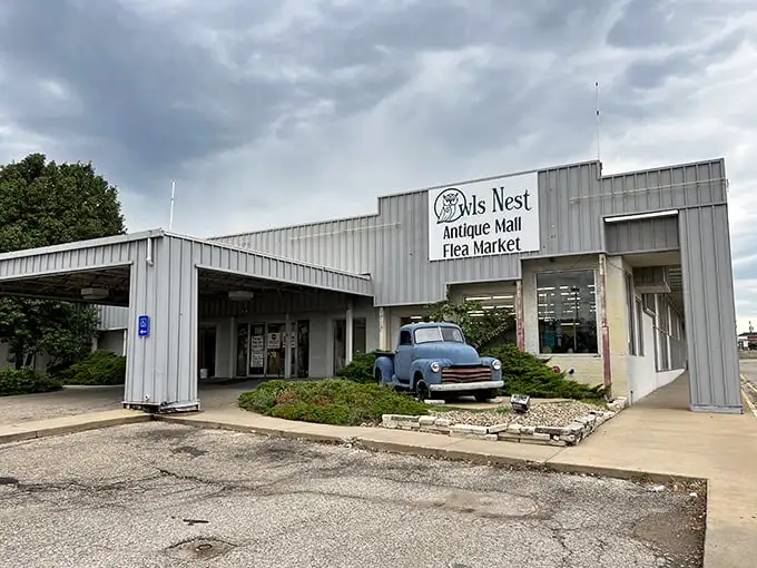 The unassuming exterior of Owls Nest hides a universe of treasures within, like finding a portal to the past behind that classic blue pickup truck.