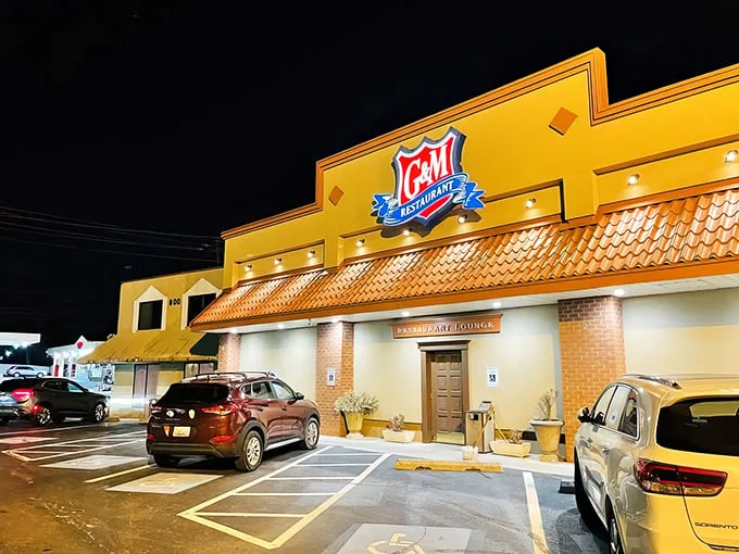 The golden glow of G & M's exterior at night isn't just lighting—it's a beacon calling all crab cake pilgrims home to their sanctuary.