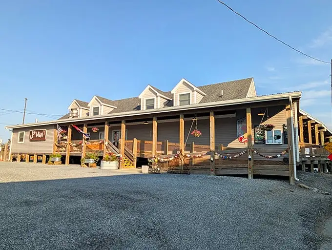 The quintessential coastal charm of JP's on the Wharf beckons with its weathered deck and Cape Cod-style architecture—seafood paradise found!