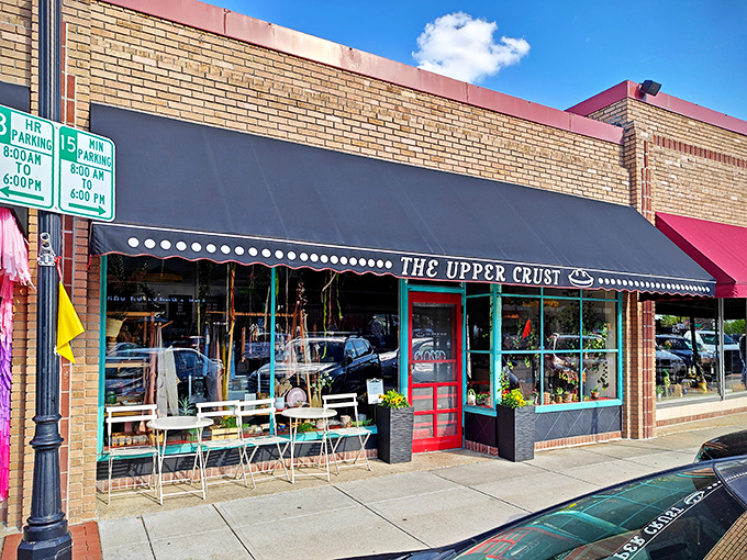 The charming storefront beckons like a siren song for pie lovers. That black awning and teal trim practically whisper, "Yes, happiness lives here."